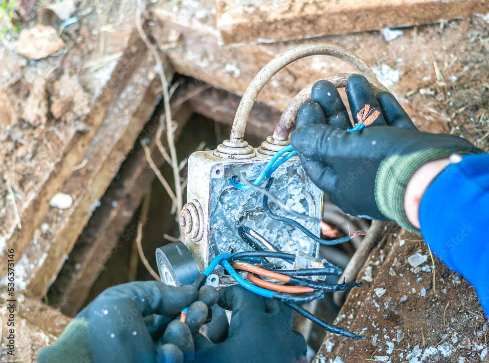 Repair work on an external lighting electrical system to an underground ...