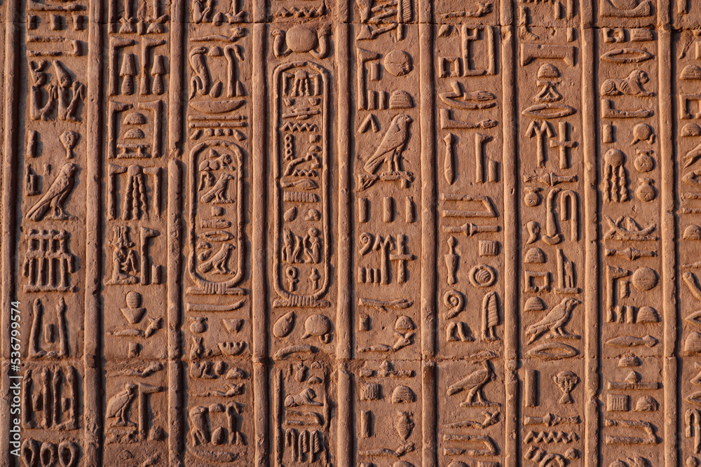 Ancient egyptian hieroglyphics carved on walls of Kom Ombo temple ...