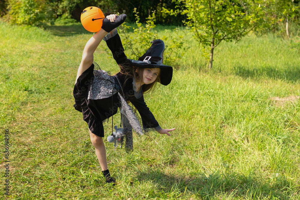 Halloween girl going to collect candy. Trick-or-treating. Guising. Jack ...