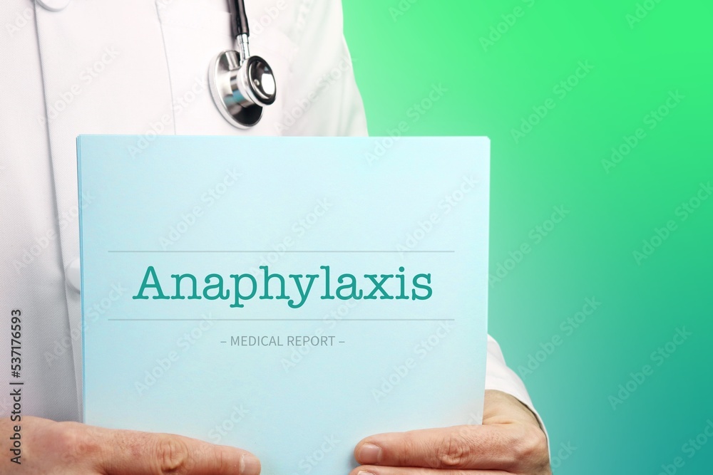 Anaphylaxis (anaphylactic shock). Doctor holds documents in his hands ...
