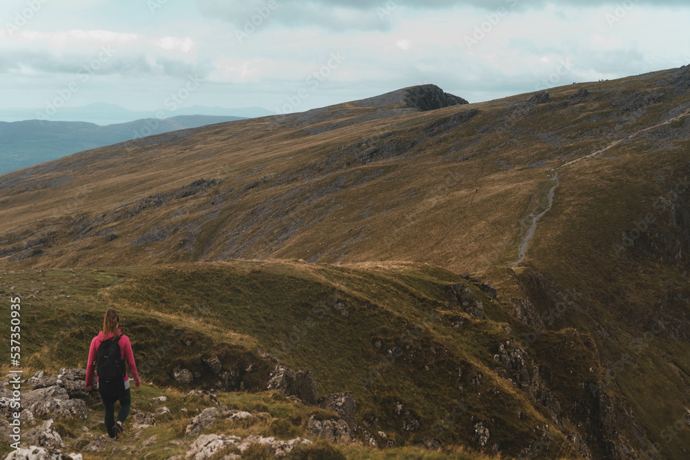 Cadair Idris girl on ridge walk Stock Photo | Adobe Stock