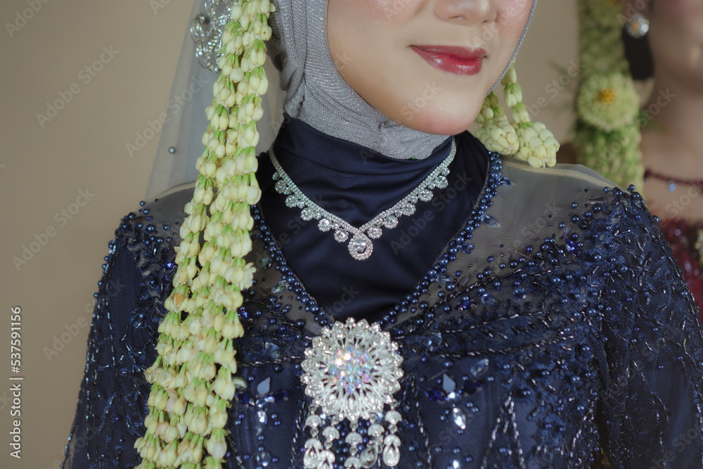 beautiful model, wearing hijab, Javanese Indonesian wedding dress in an ...