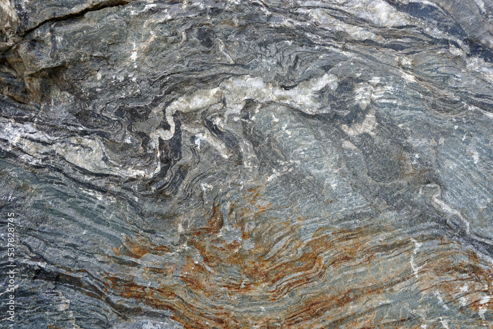 Abstract texture of gneiss foliated metamorphic rock background. it has ...