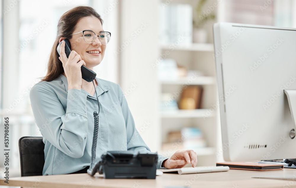 Telephone, computer and business woman in office, talking or ...