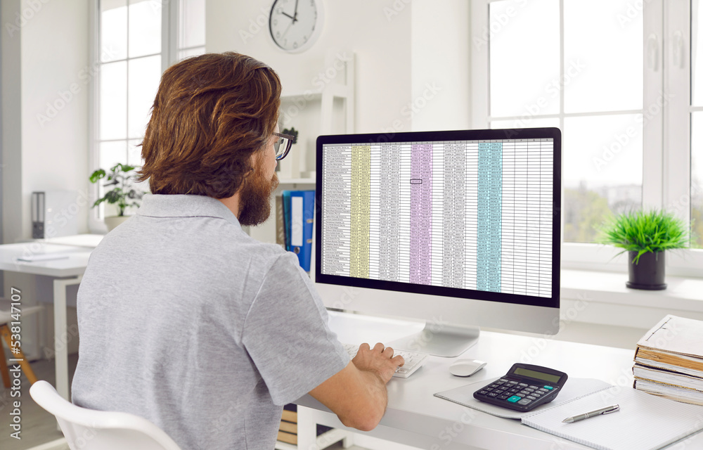 Busy corporate employee or financial accountant working on office ...