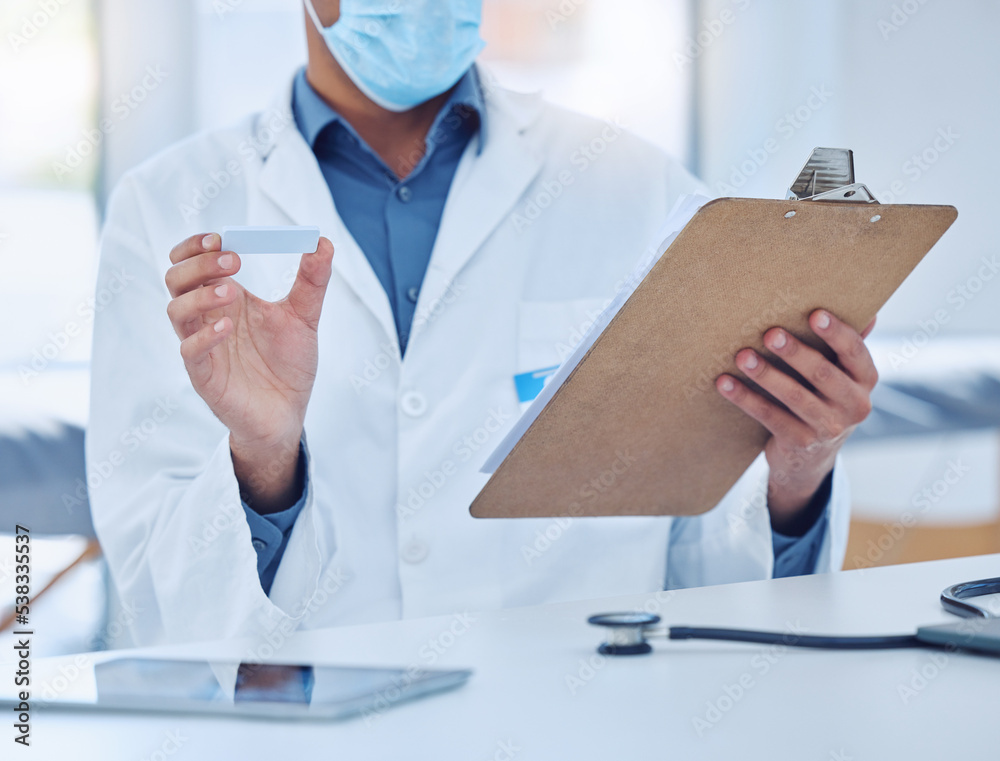Doctor hands check covid rapid antigen clipboard test results in ...