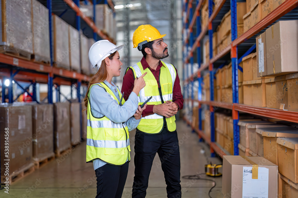 Worker in warehouse hold tablet check list perform inventory stock ... Worker in warehouse hold tablet check list perform inventory stock ...
