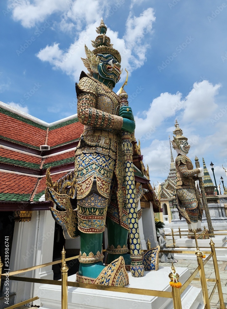 Stock-Foto „Several large giants stood guard around the gates of Wat ...