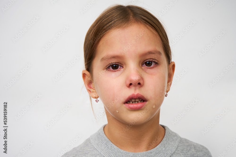 Cute little crying girl on white background with copy space Stock Photo ...