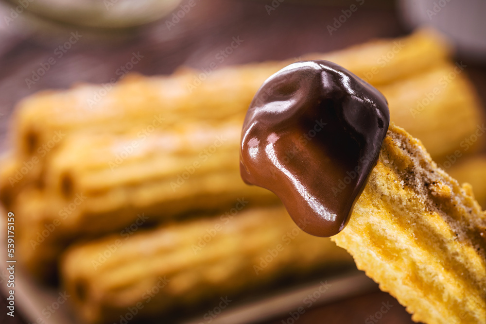 Churros, a typical sweet from Brazil and America, fried and stuffed ...