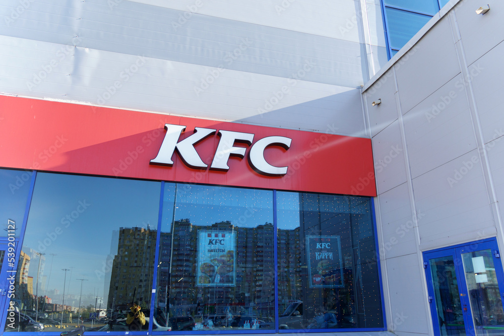 Tyumen, Russia-October 01, 2022: Fried Chicken KFC logo Restaurant in shopping mall. KFC is an ...