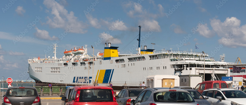 Port of Heraklion, Crete, Greece. 2022. Parked cars and an inter island ...