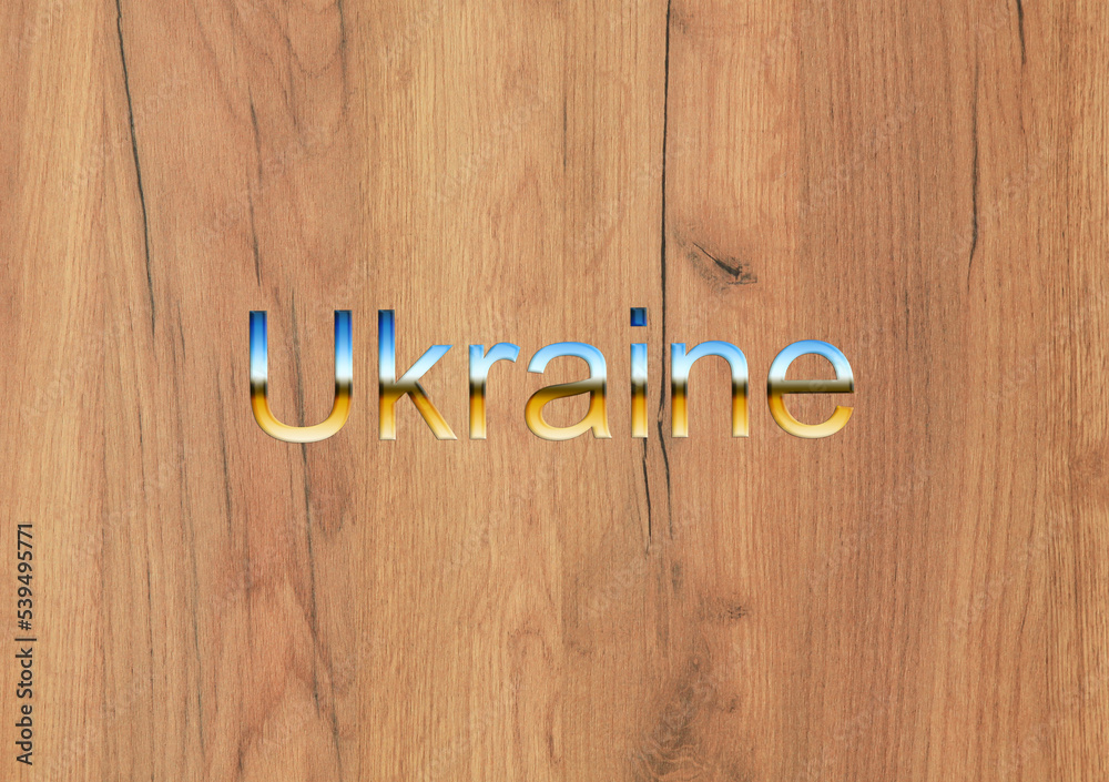 Inscription «Ukraine». Text in traditional style, is lying on wooden ...