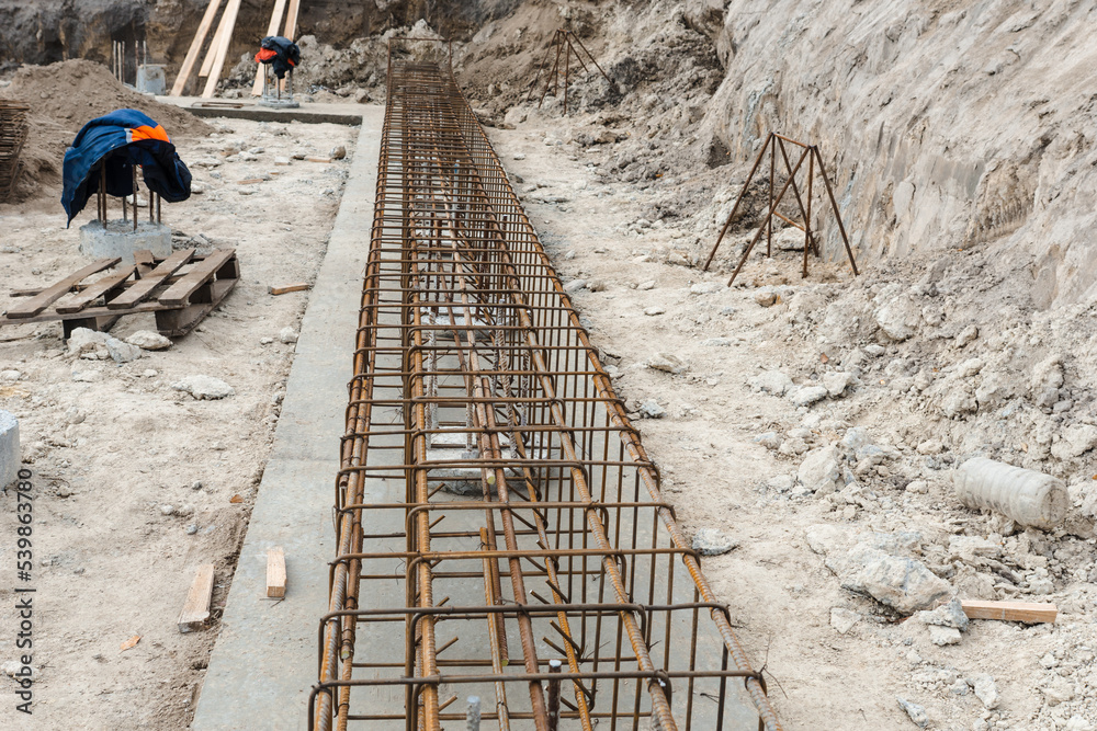 Monolithic foundation with metal reinforcement construction mesh ...