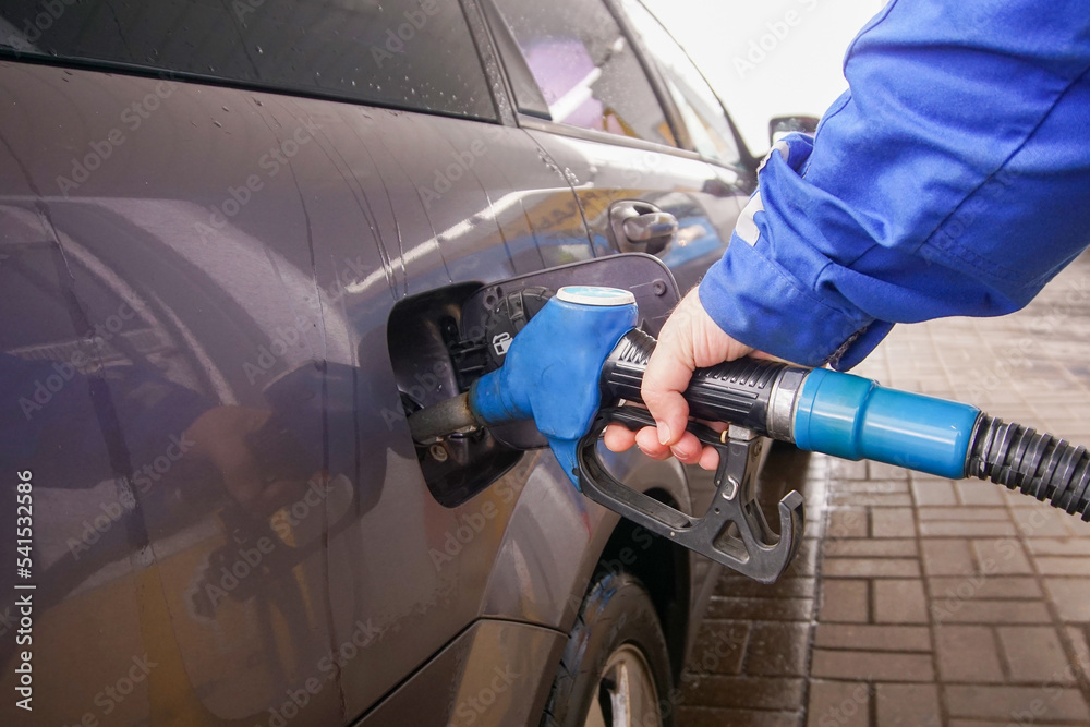 Stock-Foto „ Refueling a car with fuel at a gas station.“ | Adobe Stock
