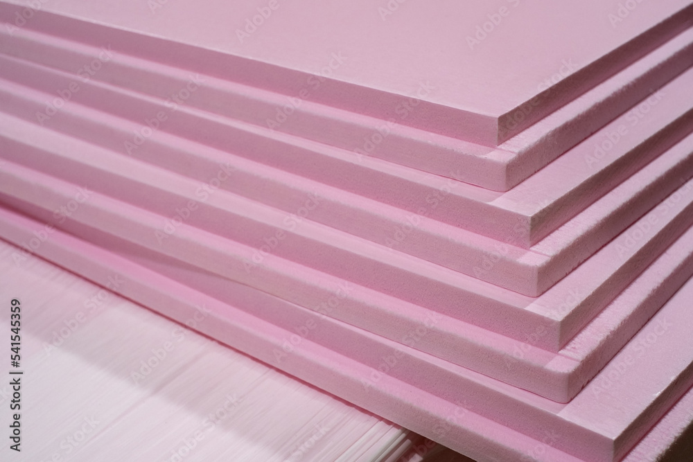 Pink Extruded Polystyrene XPS foam thermal insulation boards stacked in ...