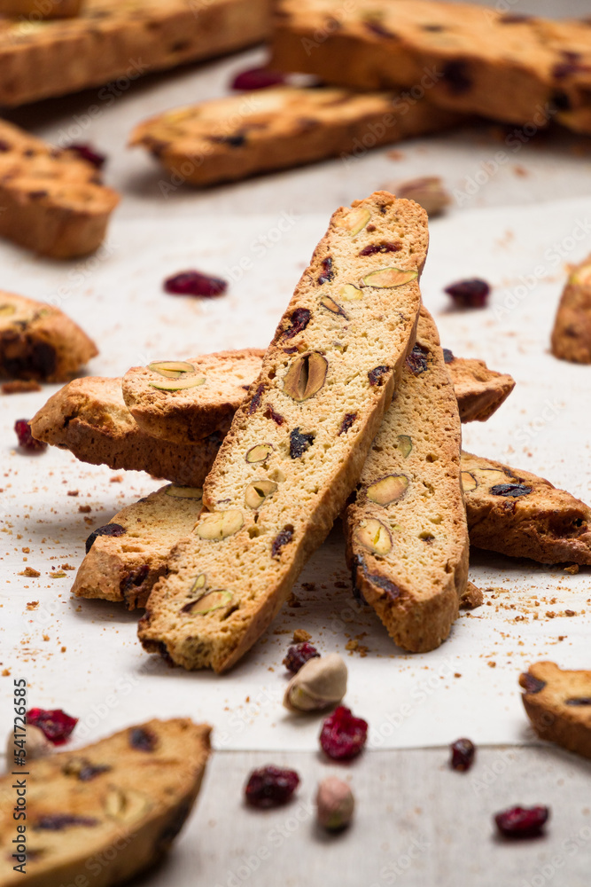 Biscotti cookies stacked vertically made with cranberry and pistachio ...