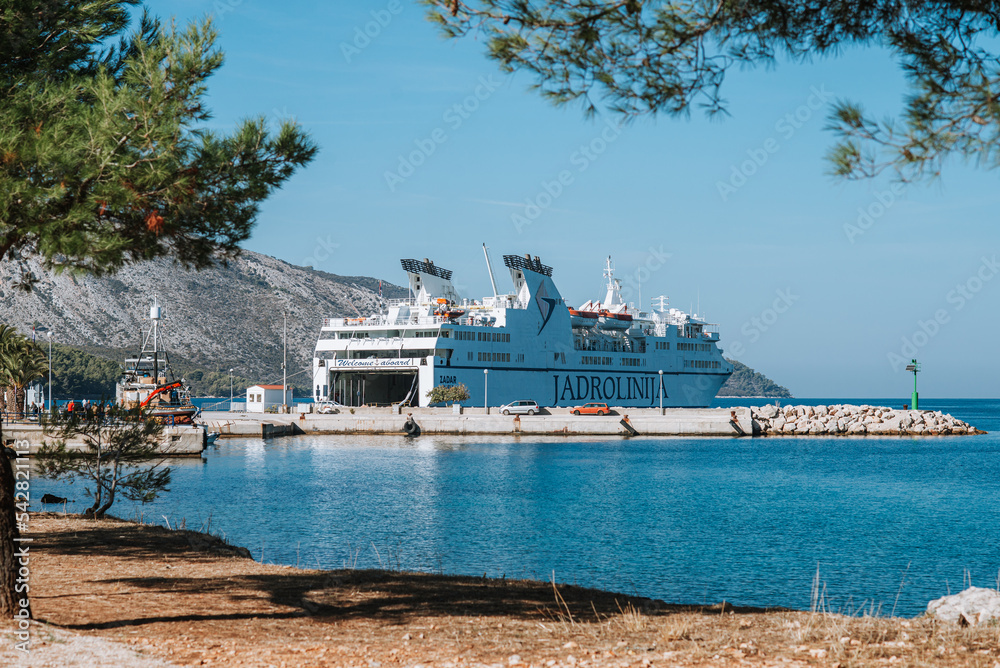 Split, Croatia - October 29, 2022: Jadrolinija car ferry arrives at the island of Hvar, Croatia ...