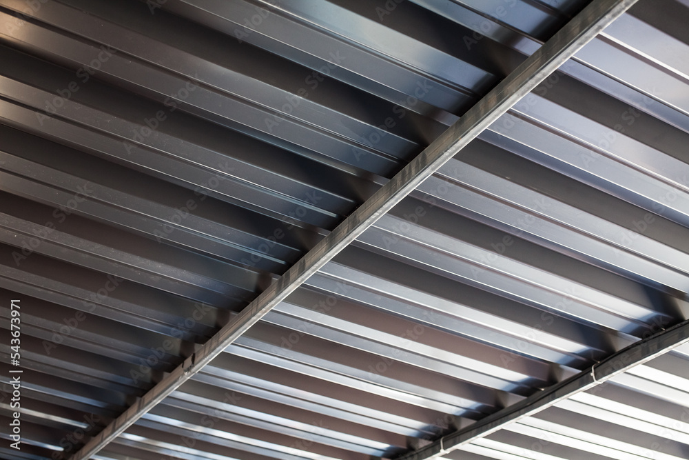 Iron structure, roof covered with corrugated aluminum sheets on metal ...