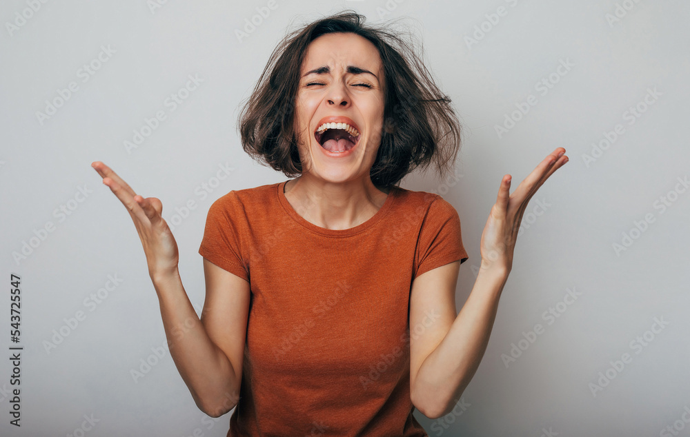 Close up shot of screaming crazy frustrated woman with anxiety, anger ...