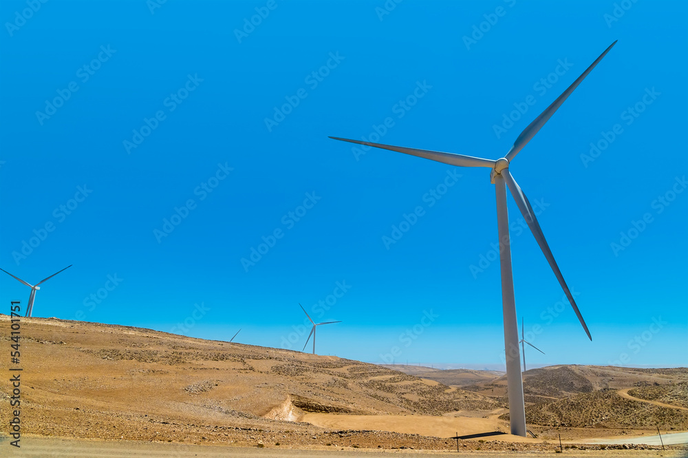 A view of wind turbines above the gorge at Little Petra, Jordan in ...