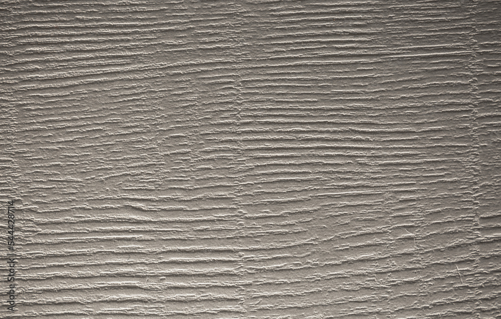 Gray background of decorative plaster with abstract spots. Unusual ...