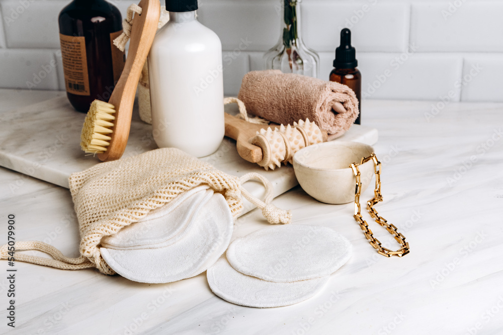 Mockup bottles shampoo, soap, shower gel, moisturizer and cotton pads ...