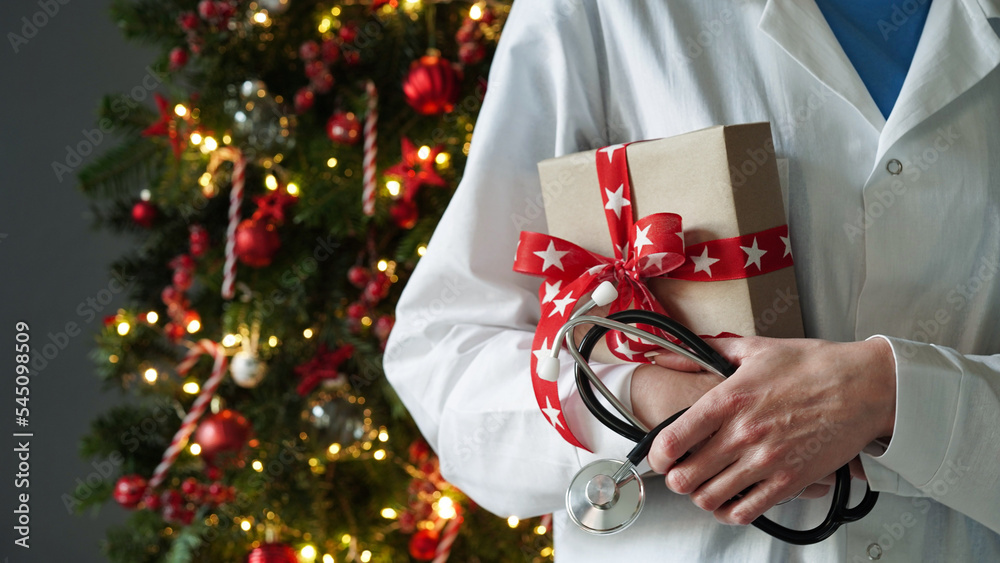 Concept for christmas and new year medical banner.Female doctor in ...