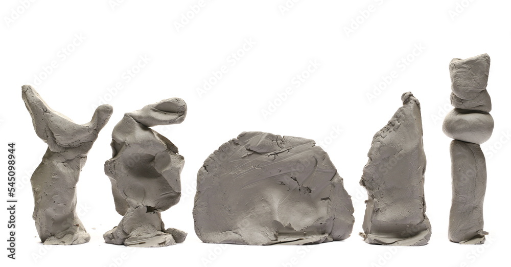 Grey modelling clay blocks, pieces and shapes isolated on white, side ...