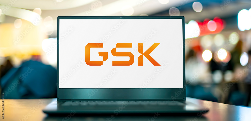 Laptop computer displaying logo of GSK Stock Photo | Adobe Stock