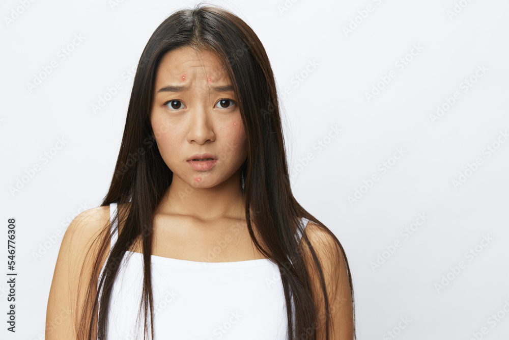 Photo Stock Asian woman hand signals, finger pointing facial skin ...