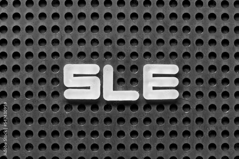 White alphabet letter in word SLE (Abbreviation of Systemic lupus ...