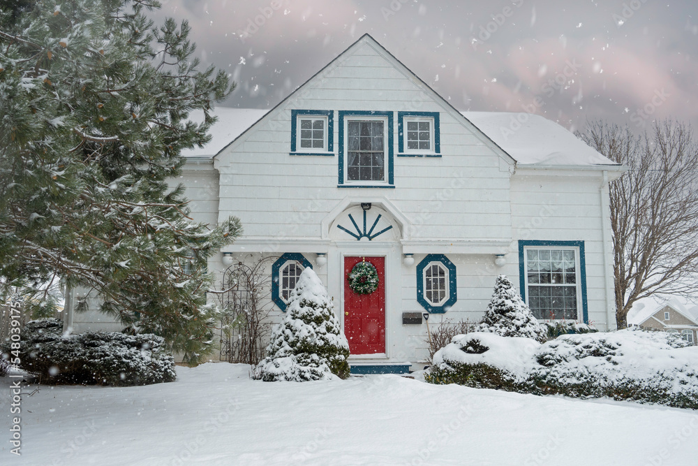 A traditional older North American home buried in snow. Stock Photo ...