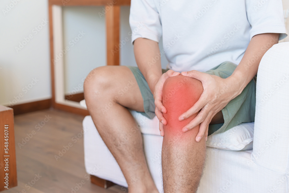 Man having knee ache and muscle pain due to Runners Knee or ...