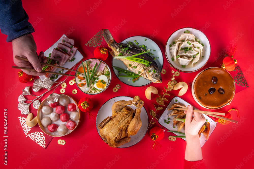 Traditional Chinese lunar New Year dinner table, party invitation, menu ...