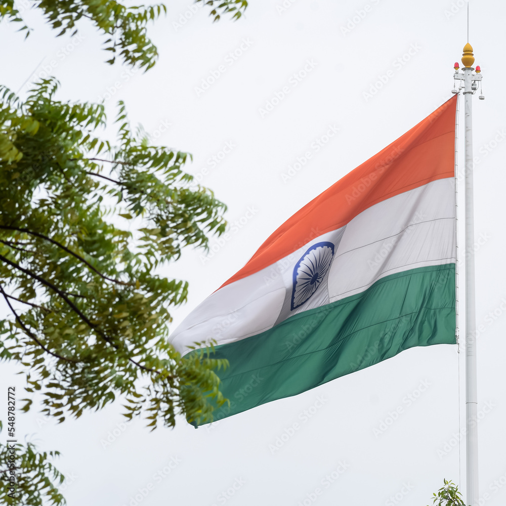 India flag flying high at Connaught Place with pride in blue sky, India ...