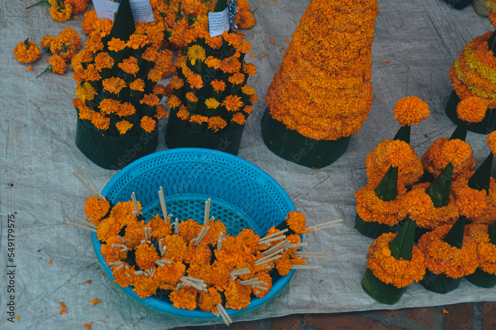Ton dauk dao heuang or marigold flower trees shaped as stupa or jedi ...