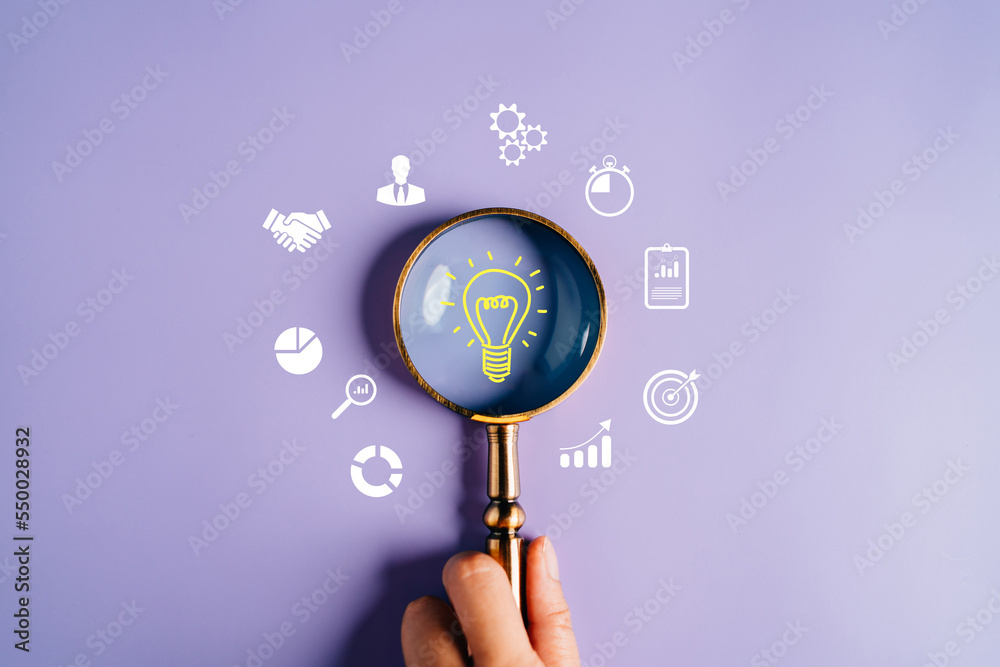 Magnifying glass focus to light bulb icon which for mind, creative ...
