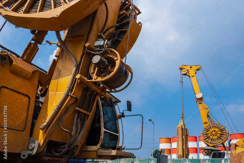 Low angle view of Earth drilling crawler crane with hydraulic diaphragm ...