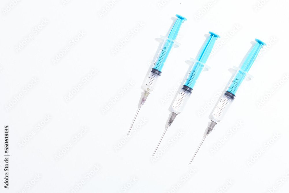 Disposable plastic syringe prepared for injection and vaccination in ...