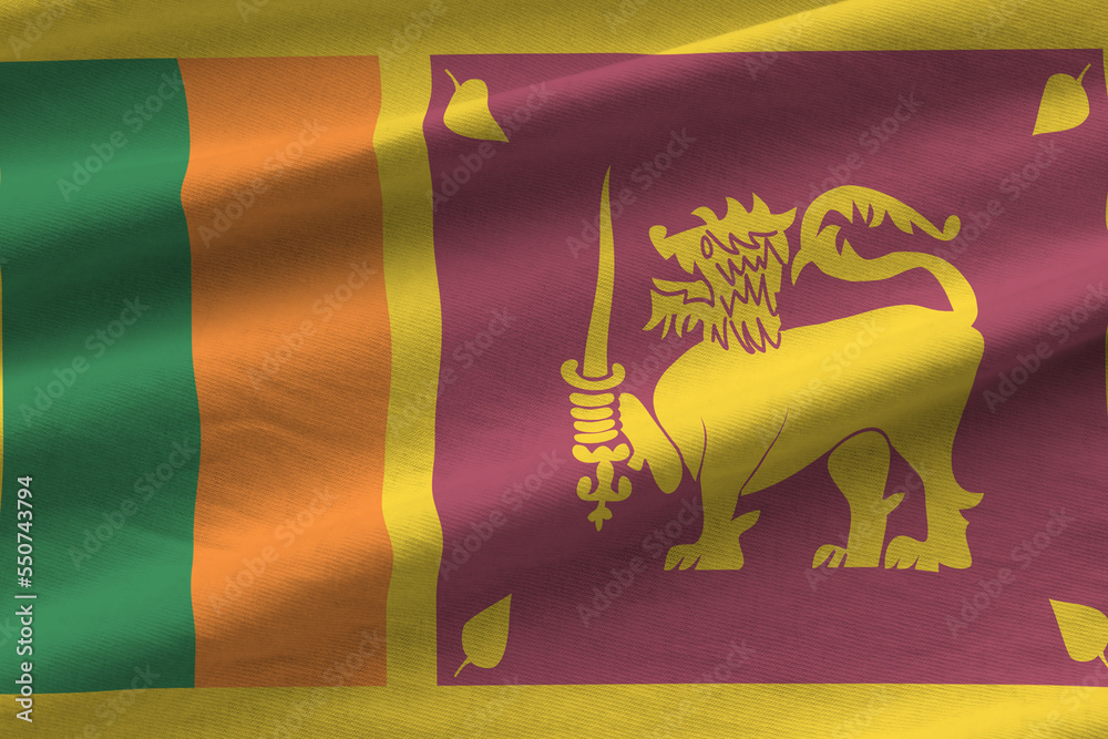 Sri Lanka flag with big folds waving close up under the studio light indoors. The official ...