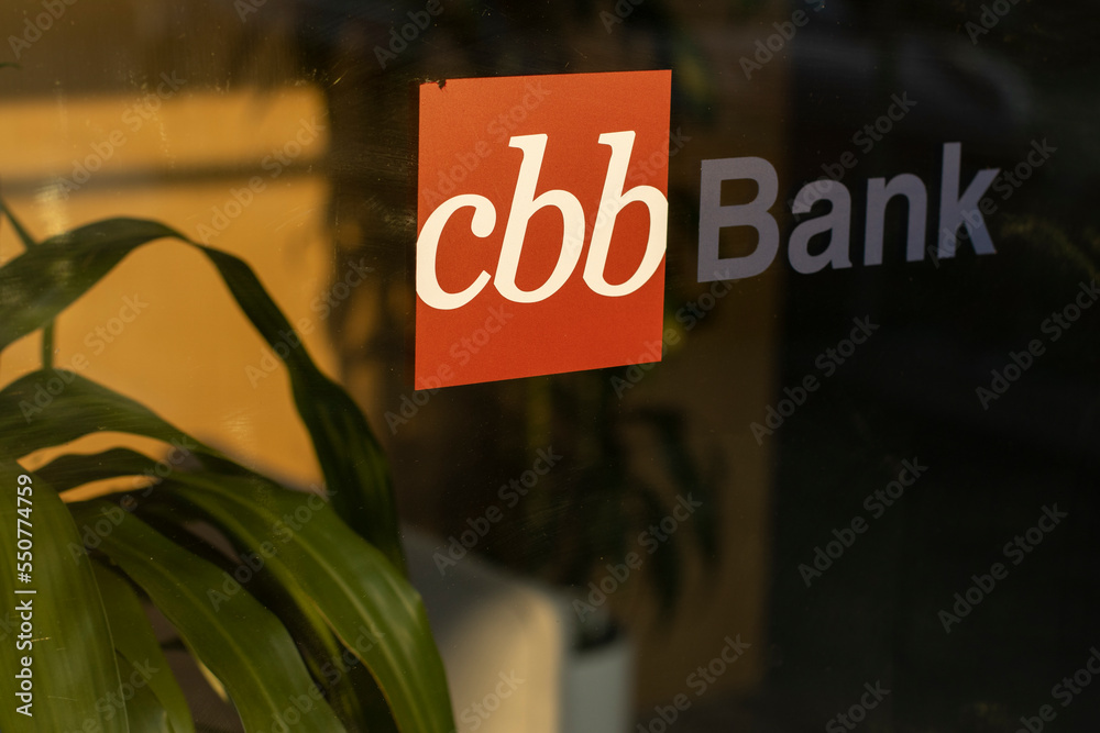 Irvine, CA, USA - May 7, 2022: CBB Bank logo is seen at the entrance to ...