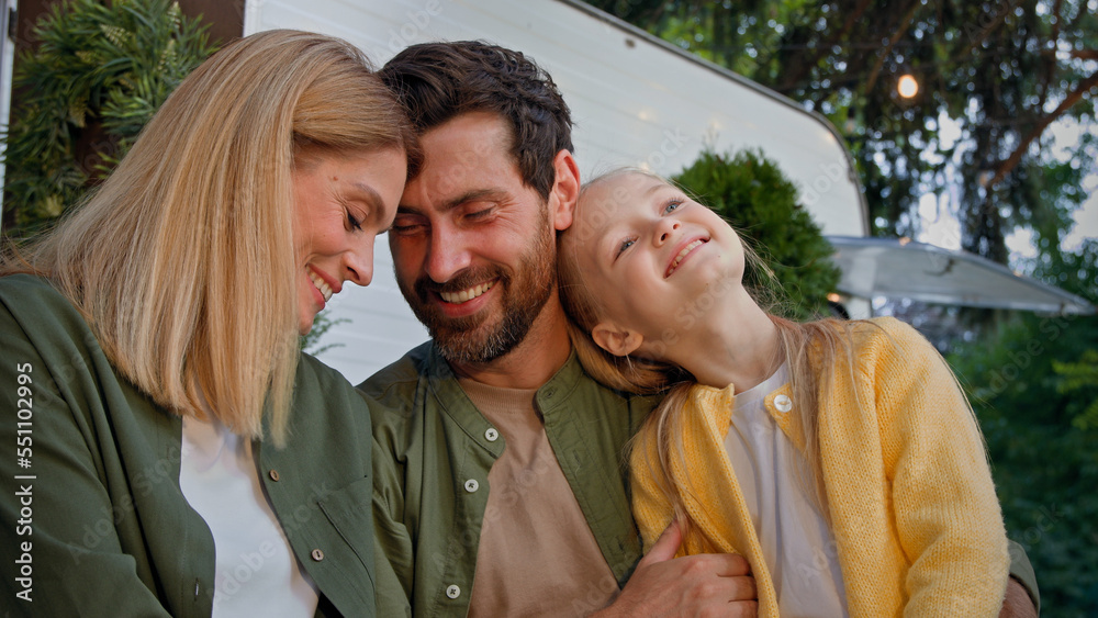 Caucasian happy loving family talking outdoors dad touching nose of ...