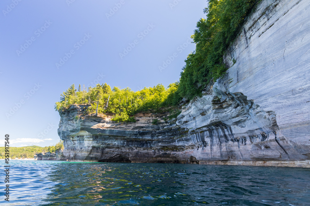 Natural arches and sea caves along Lake Superior at Pictured Rocks ...