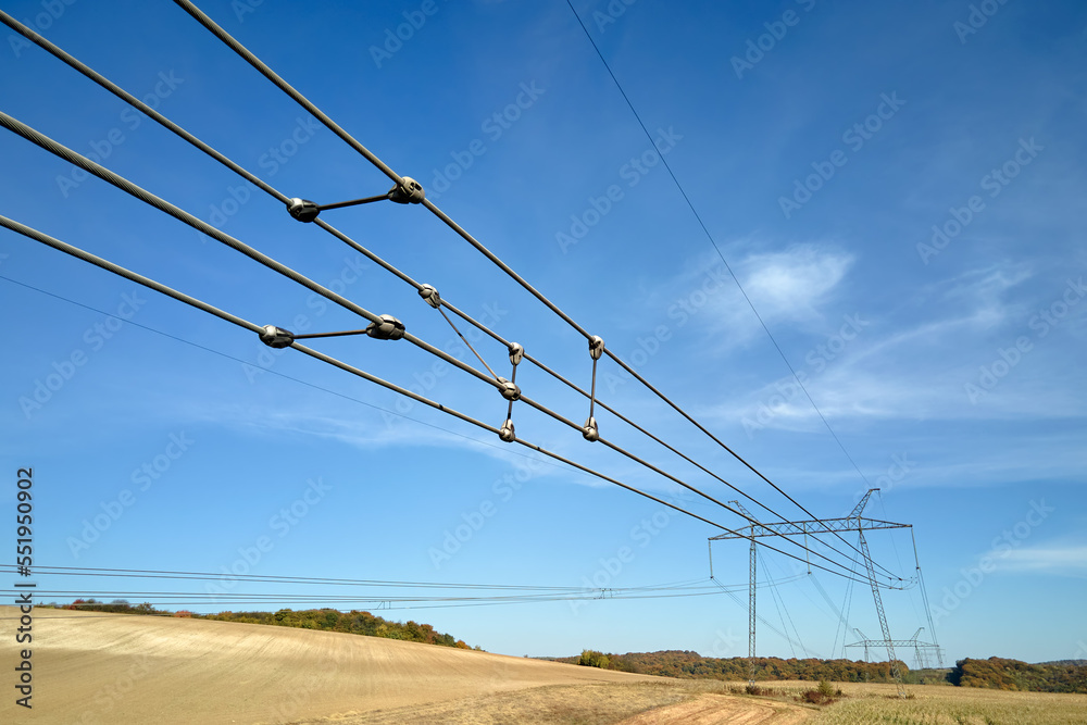 High voltage power line with insulation divider of electric power wires ...