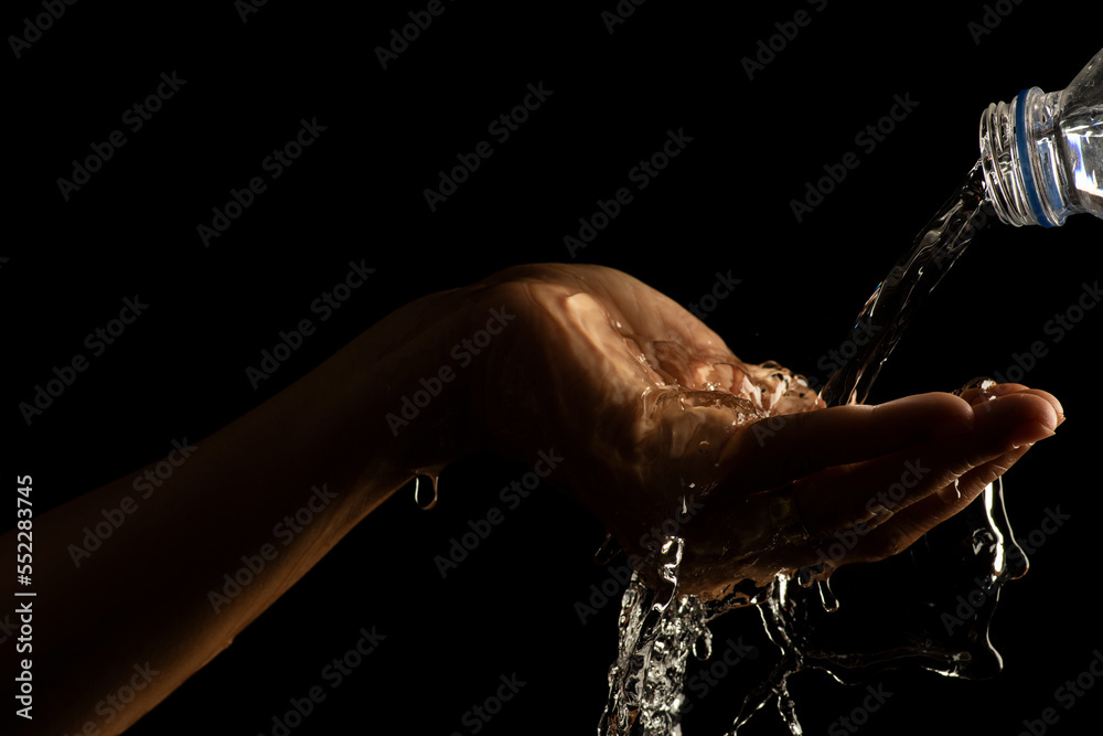 Water splashing on hand water captured at high speed slow motion ...
