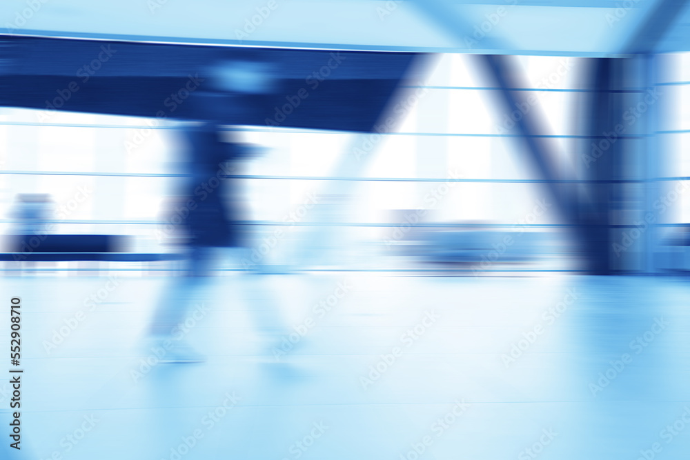 blurry abstract business background blue movement people concept inside ...
