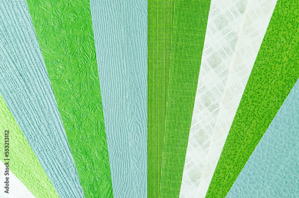 color swatch of green paper texture made from recycled paper is used by ...