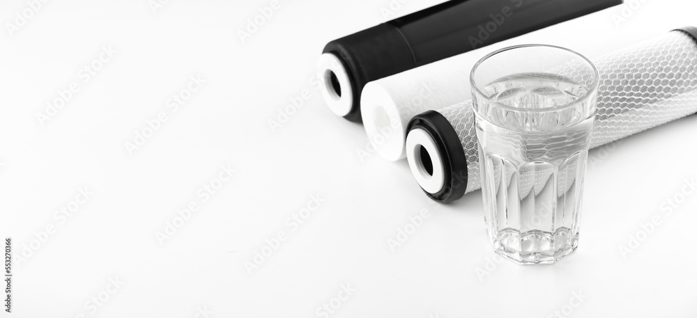 Banner of three of cartridges for water filter with clear fresh glass ...