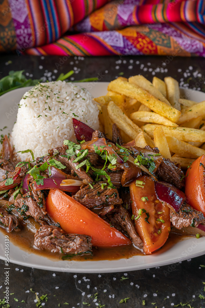 Lomo saltado, a traditional Peruvian stir fry that combines marinated ...